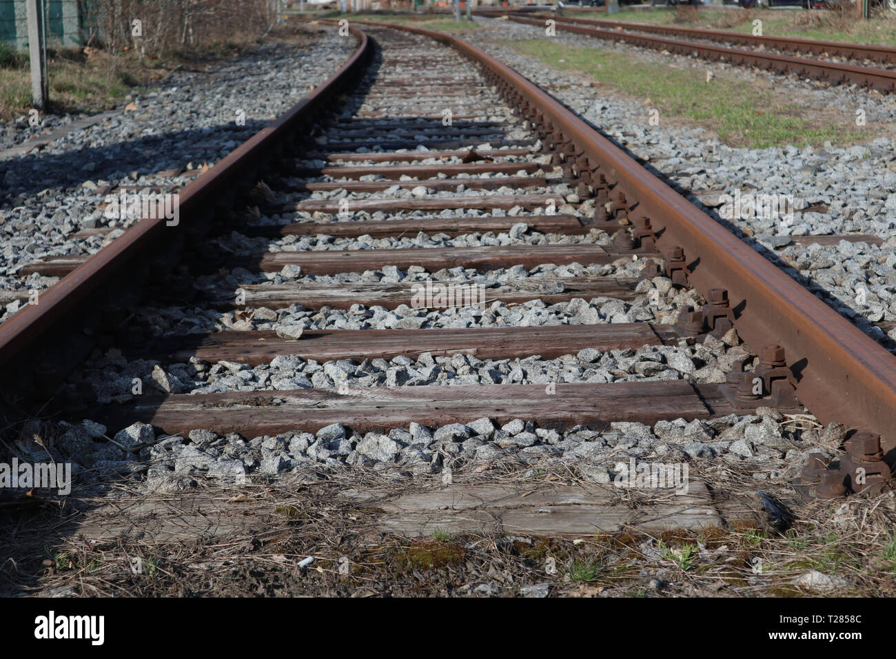 Rail track with wooden sleepers Stock Photo - Alamy