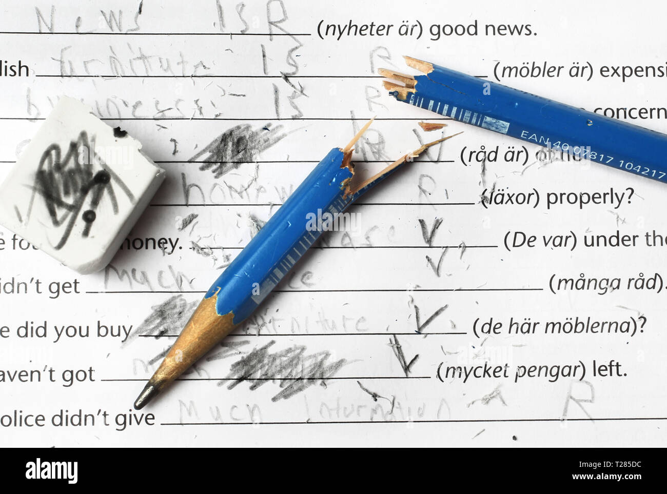 A failed test for a student in English with blah and pencil. Photo ...