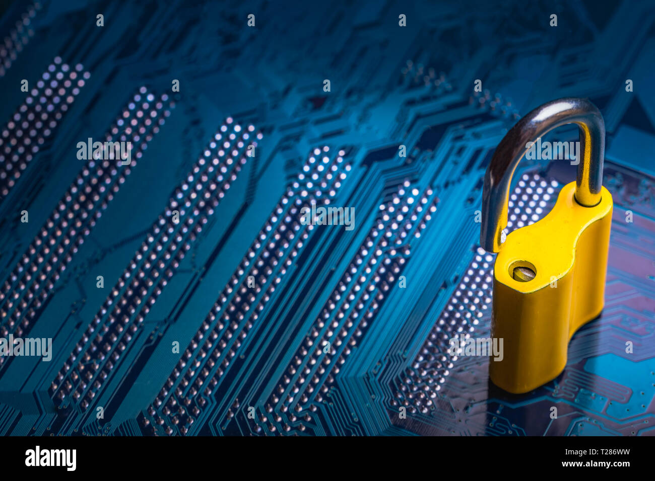 Background image of metal lock on a microchip Stock Photo - Alamy