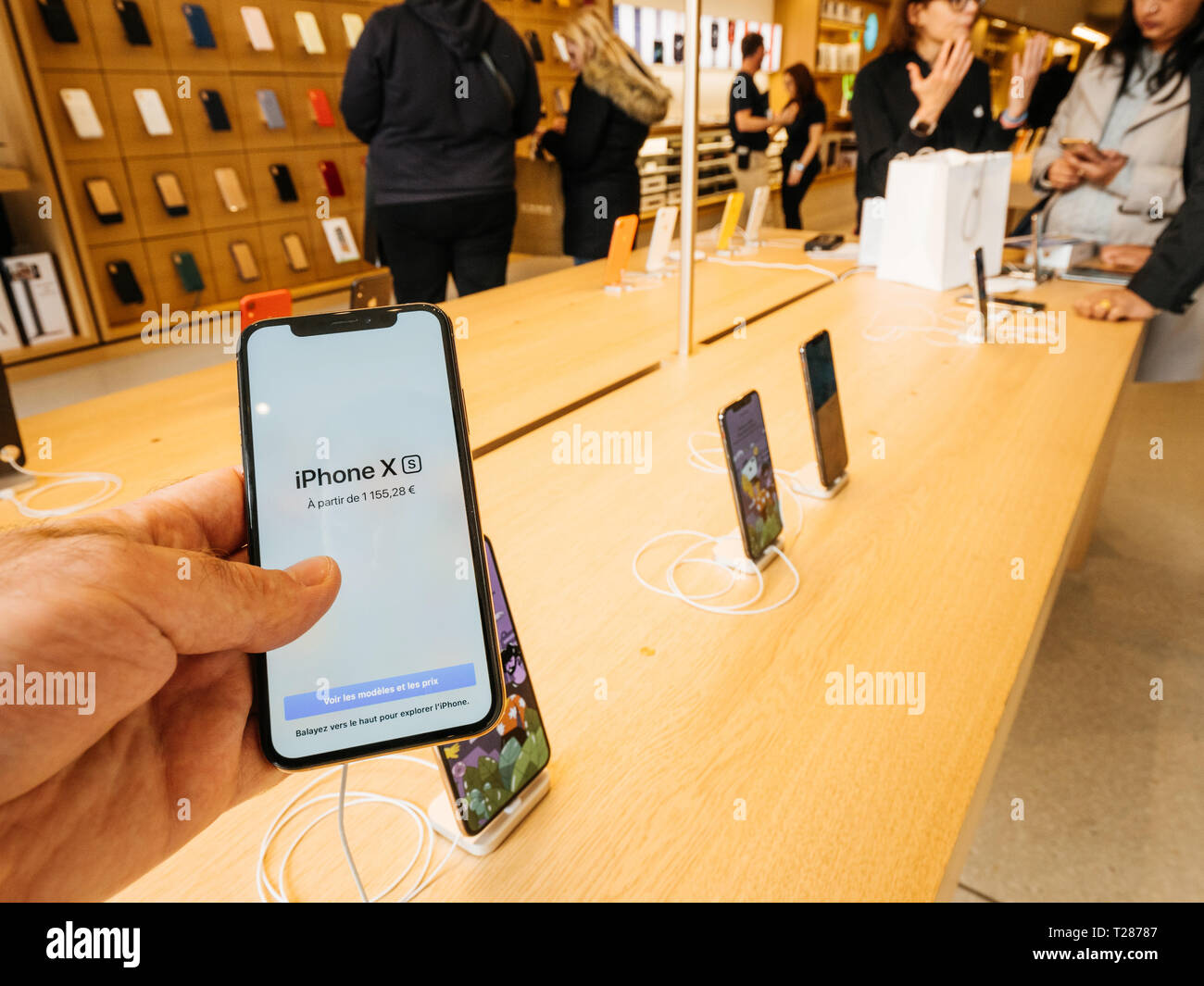 Paris, France - Mar 19 2019: Apple Computers flagship iPhone XS gold ...