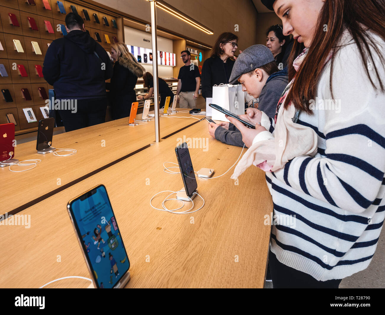 Paris, France - Mar 19 2019: Apple Computers flagship iPhone XS gold ...