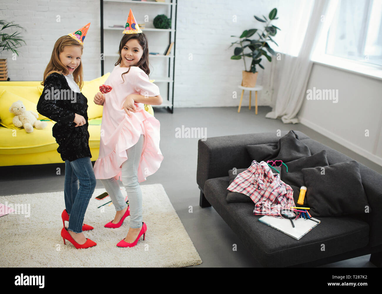 Two Teenage Girls Have Fun Together In Room They Dance And Pose On 7459