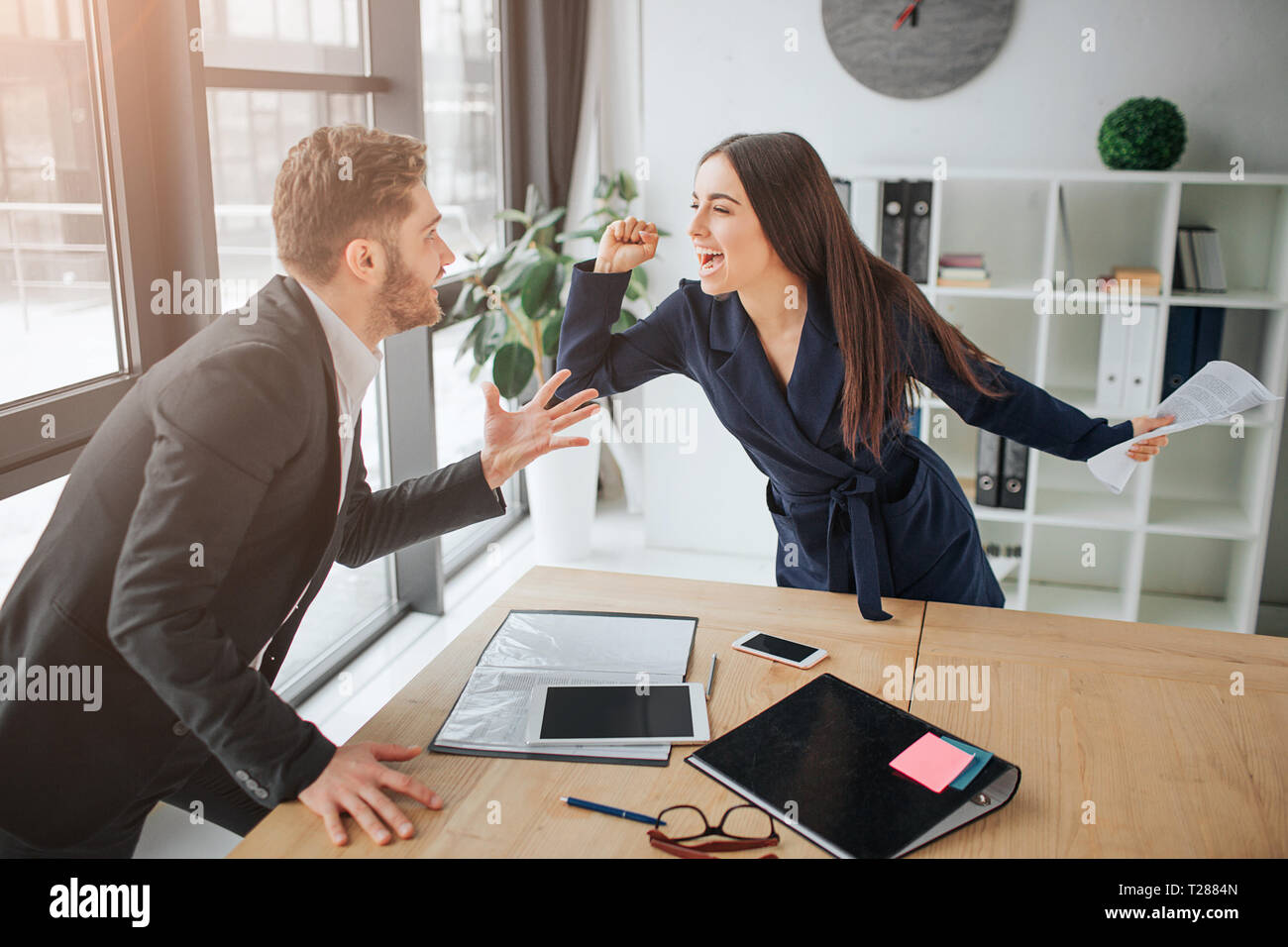 Argue between young man and woman. She scream and fight with guy. They ...