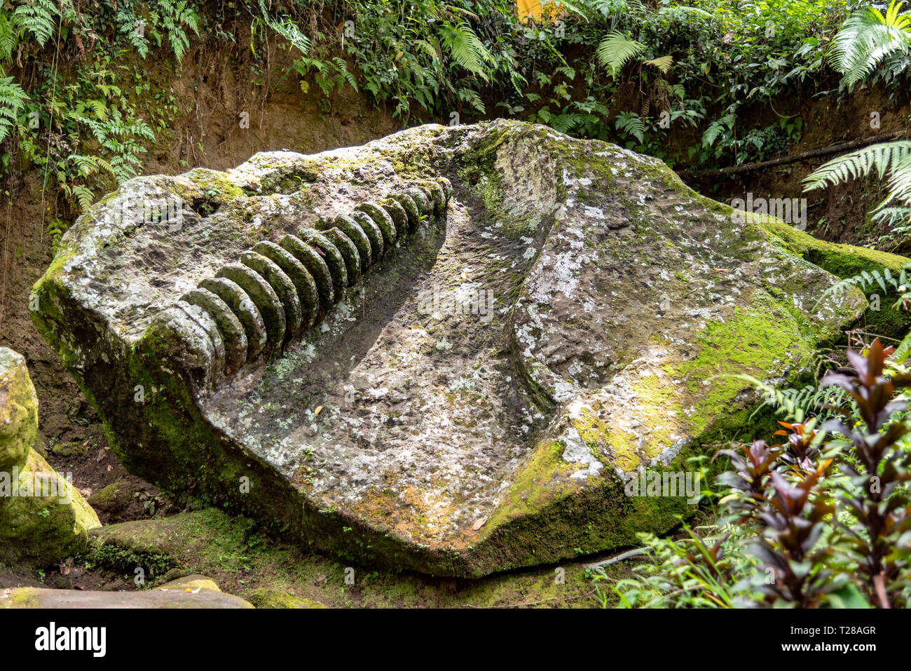 Ancient stone carvings at Goa Gajah Sanctuary Ubud, Bali, Indonesia ...