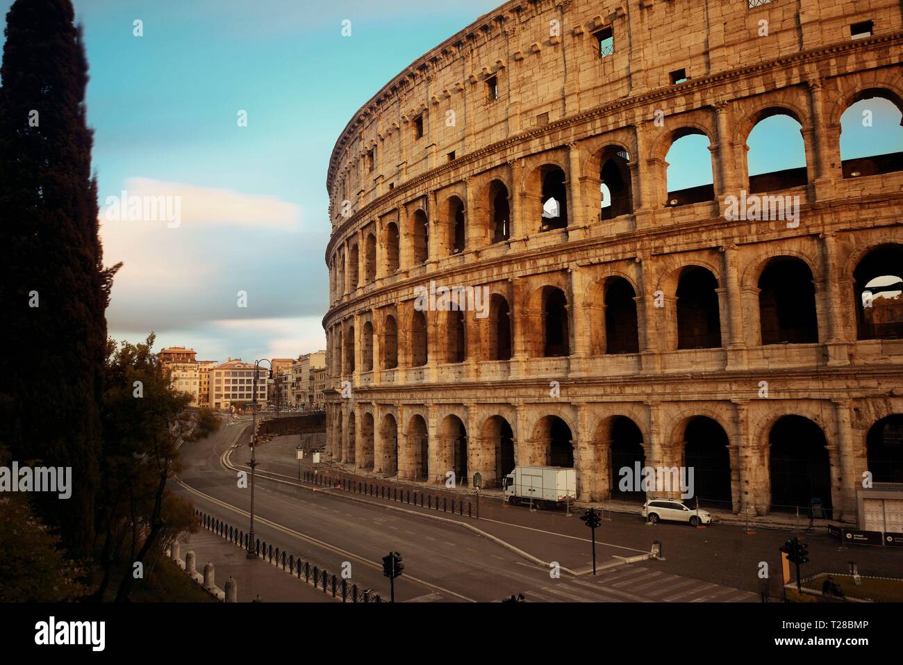 Colosseum with street view at sunset, the world known landmark and the ...