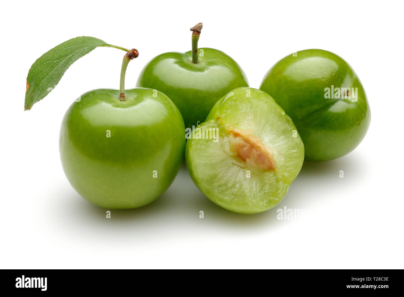 Fresh green plums with leaf isolated on white background Stock Photo ...