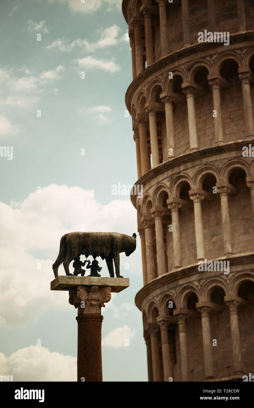Leaning tower with Capitoline Wolf (or she-wolf) sculpture in Pisa ...