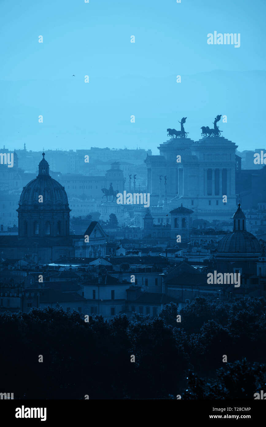 Rome rooftop view at sunrise silhouette with ancient architecture in ...