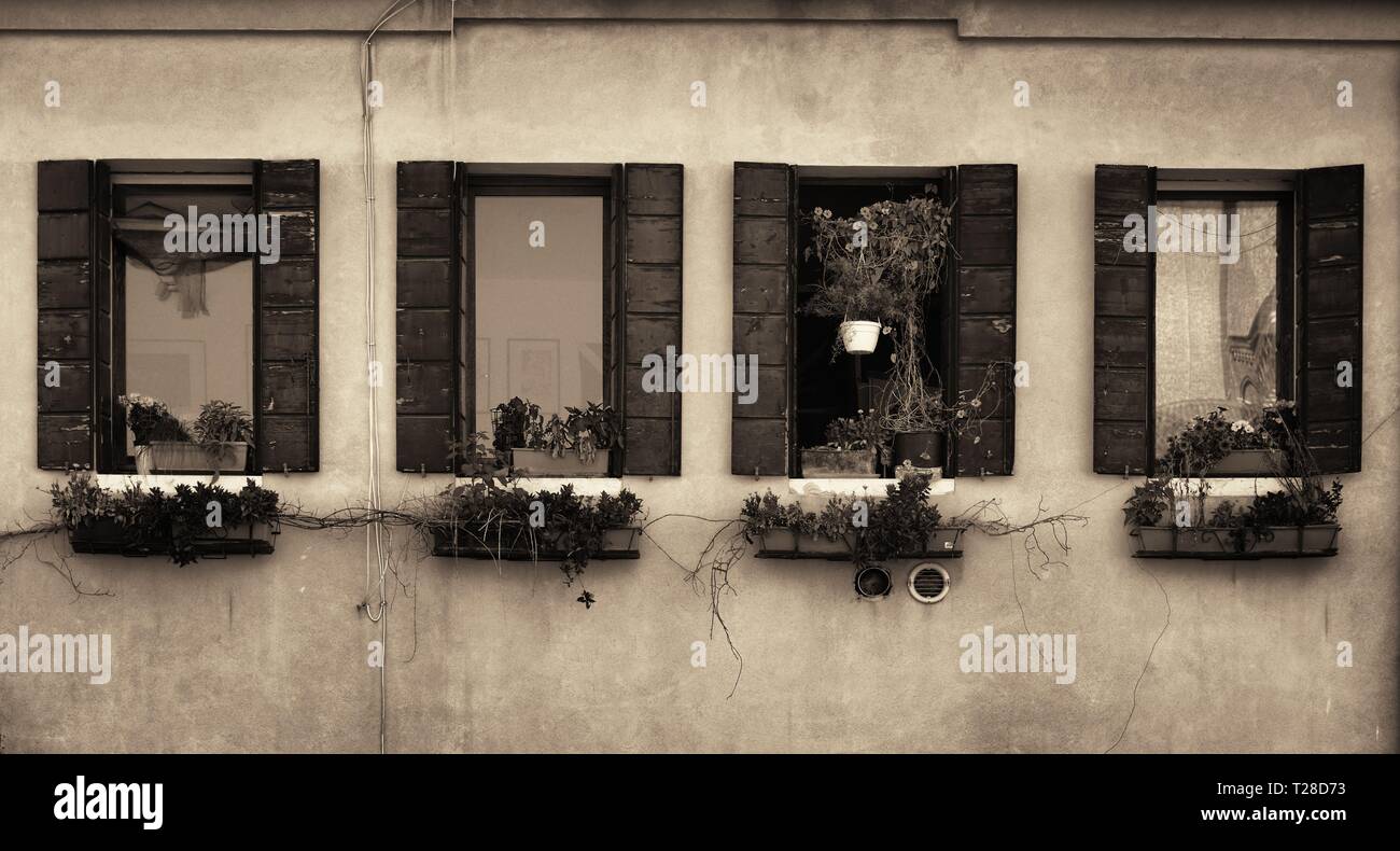 A closeup view of window in historical buildings in Venice, Italy Stock ...