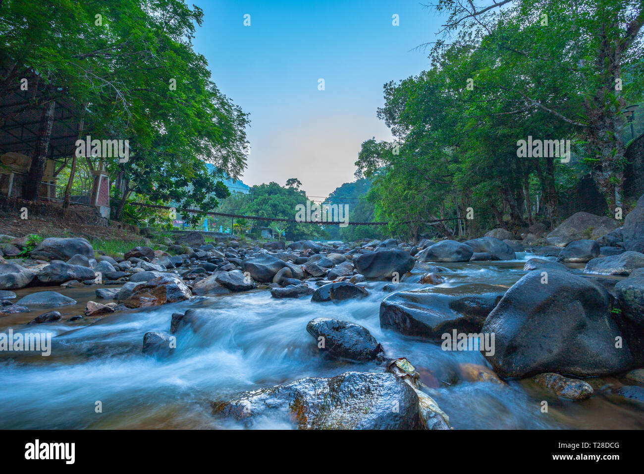 sunrise above waterfall beside Ranong hot spring Ranong hot spring ...