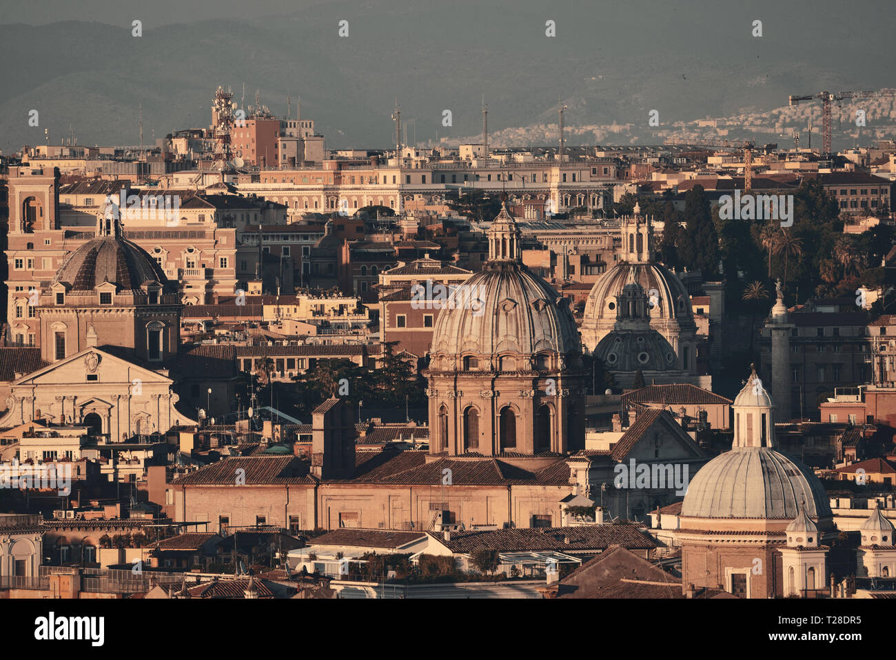 Rome rooftop view with ancient architecture in Italy at sunset moment ...