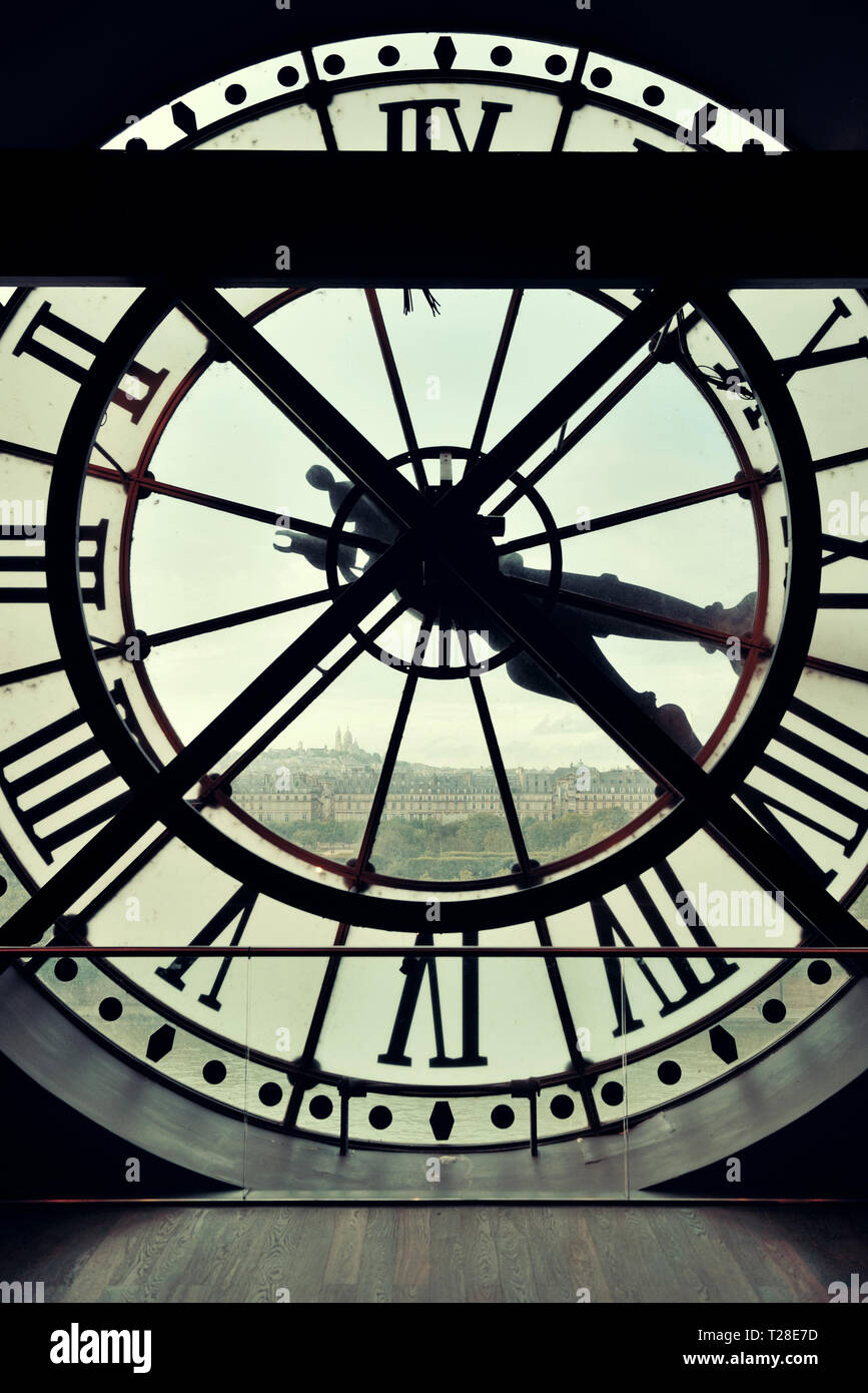 City view through Giant clock tower in Paris, France Stock Photo - Alamy