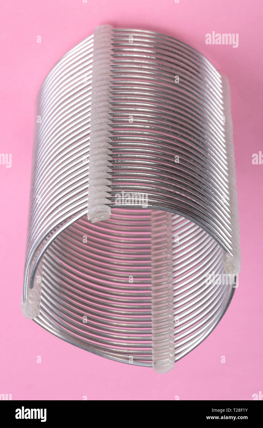 radio coil on pink background Stock Photo - Alamy