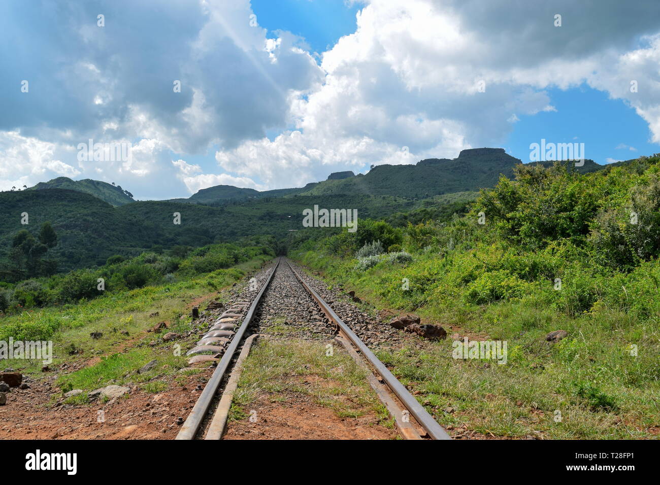 A railway track against a mountain bcakground, Kenya Stock Photo - Alamy