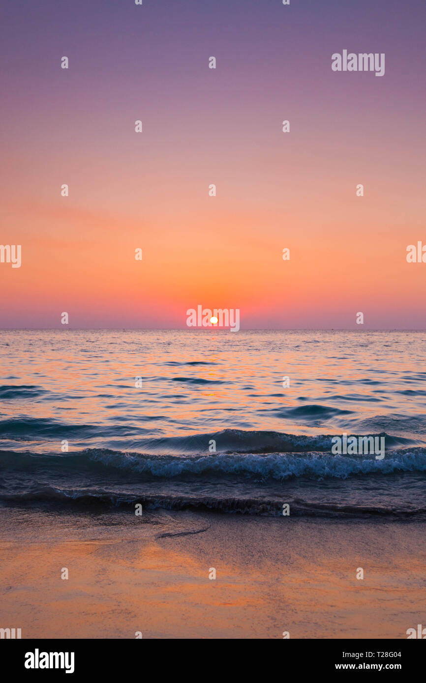 Amazing colorful sunset over sea form Bali beach Stock Photo - Alamy