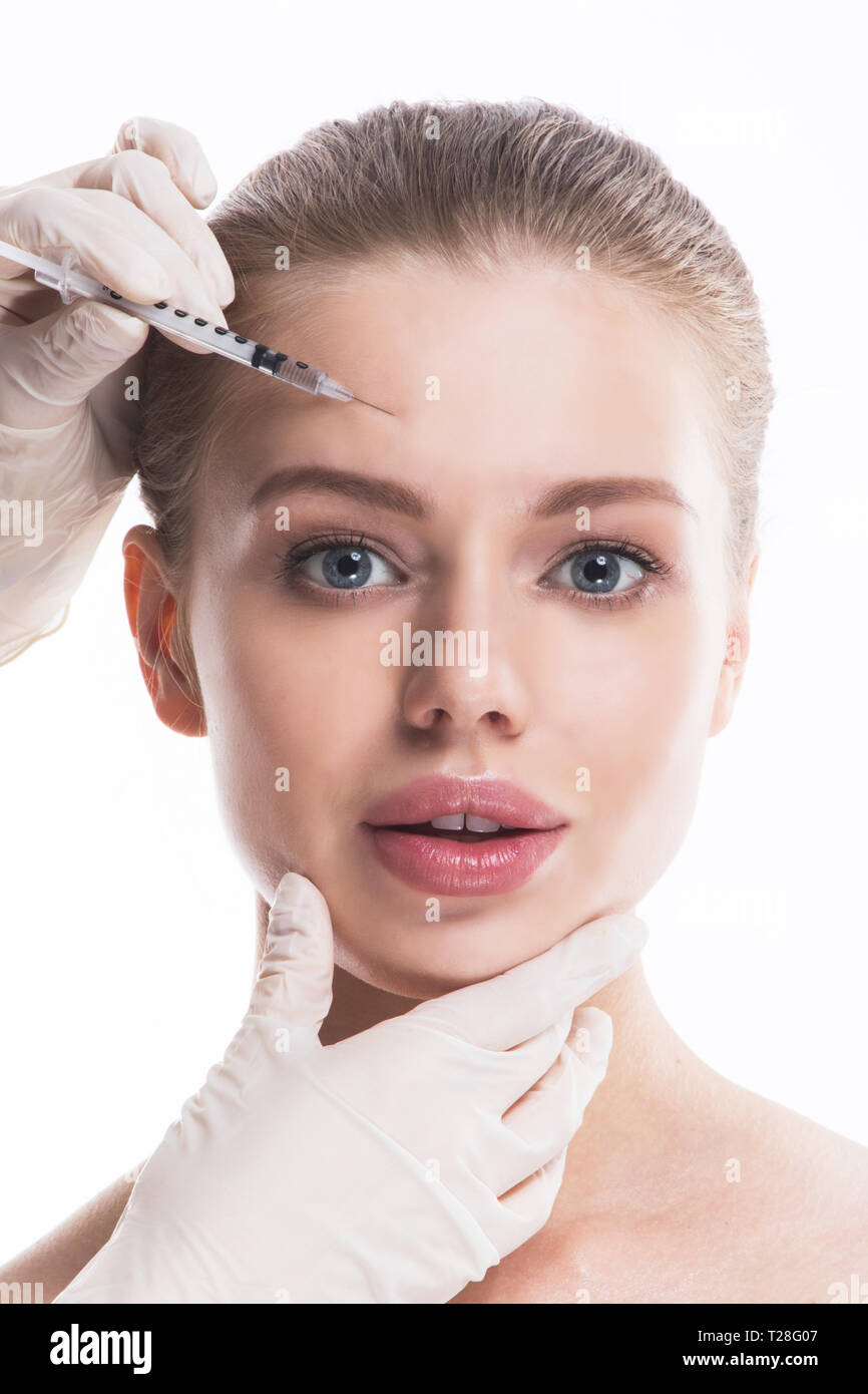 Cosmetic injection to female face isolated on white background Stock ...