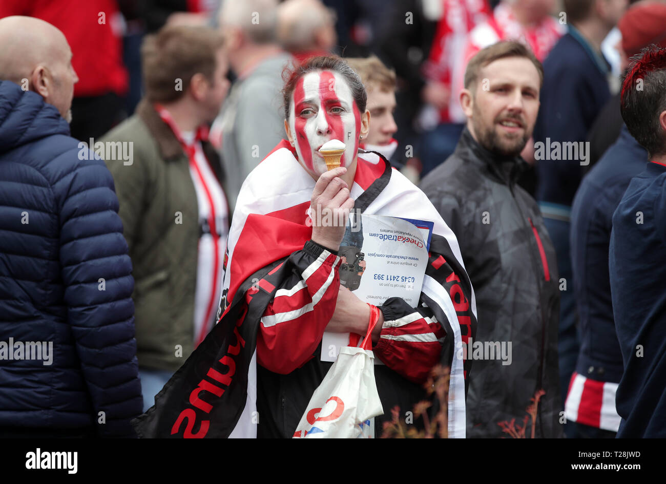 A Sunderland fan enjoys an ice cream during the Checkatrade Trophy ...
