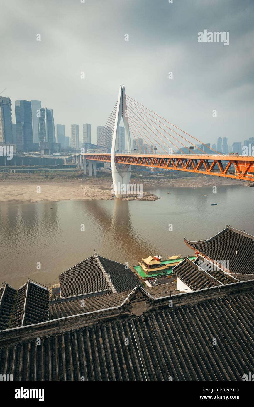 Bridge with old house and city urban architecture in Chongqing, China ...