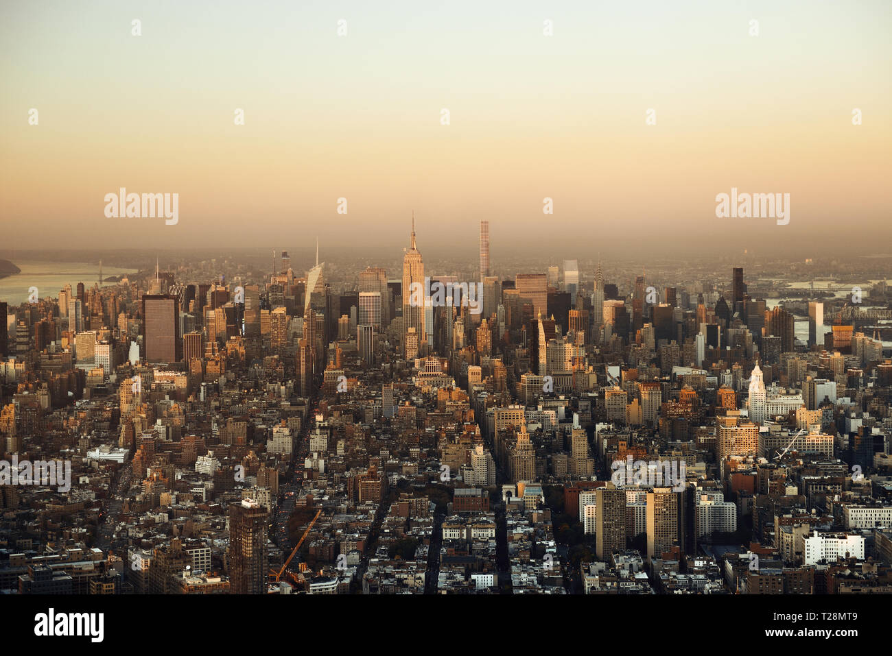Manhattan midtown sunset rooftop view with urban skyscrapers in New York City Stock Photo - Alamy