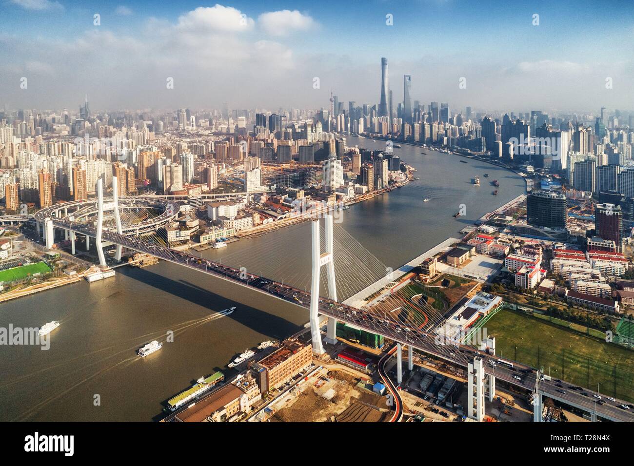 Shanghai Nanpu Bridge over Huangpu River with busy traffic in China ...