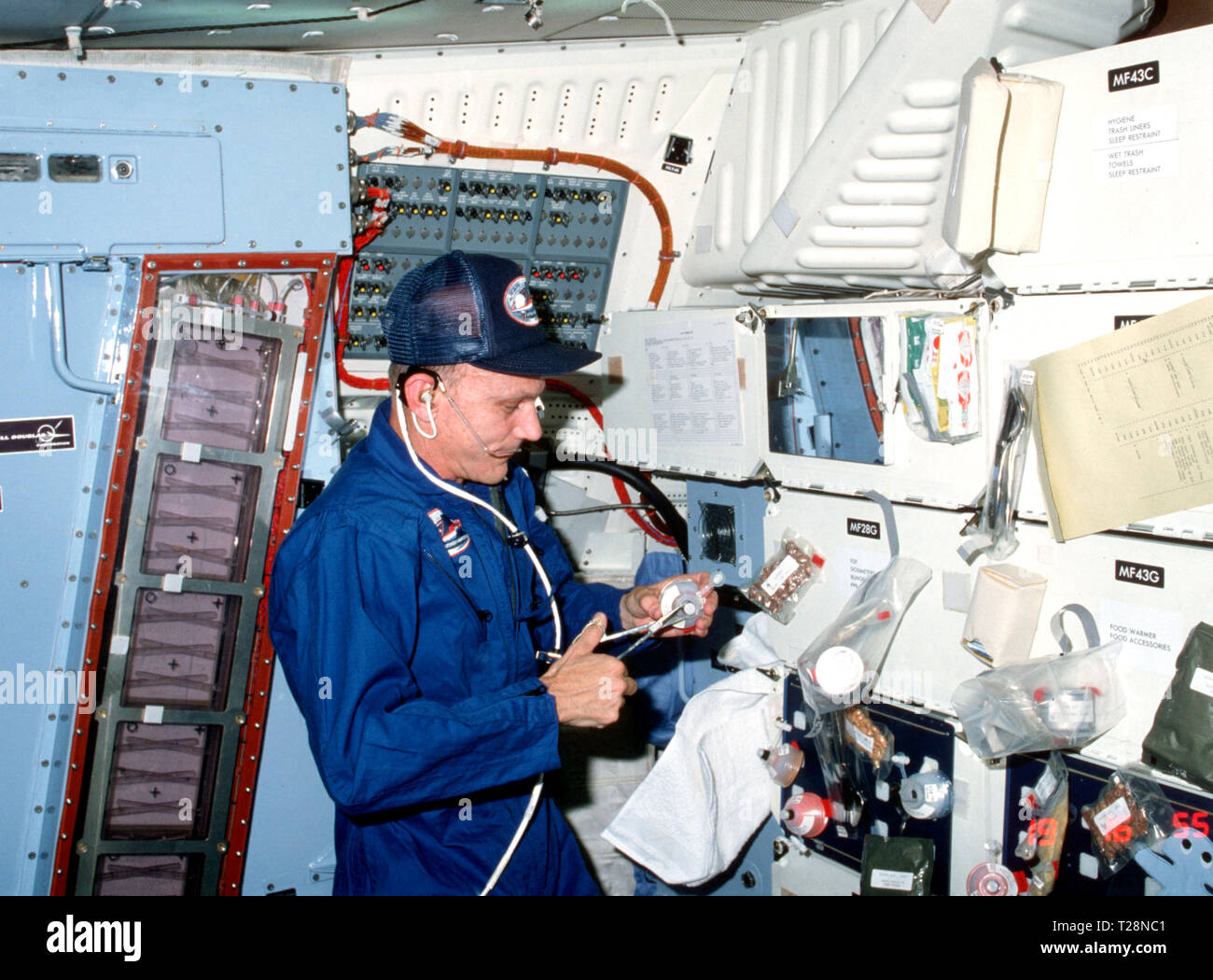 Eating food on space shuttle hi-res stock photography and images - Alamy