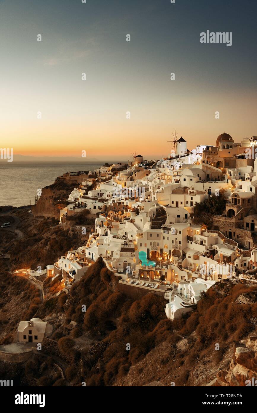Santorini skyline sunset with windmill and buildings in Greece Stock ...