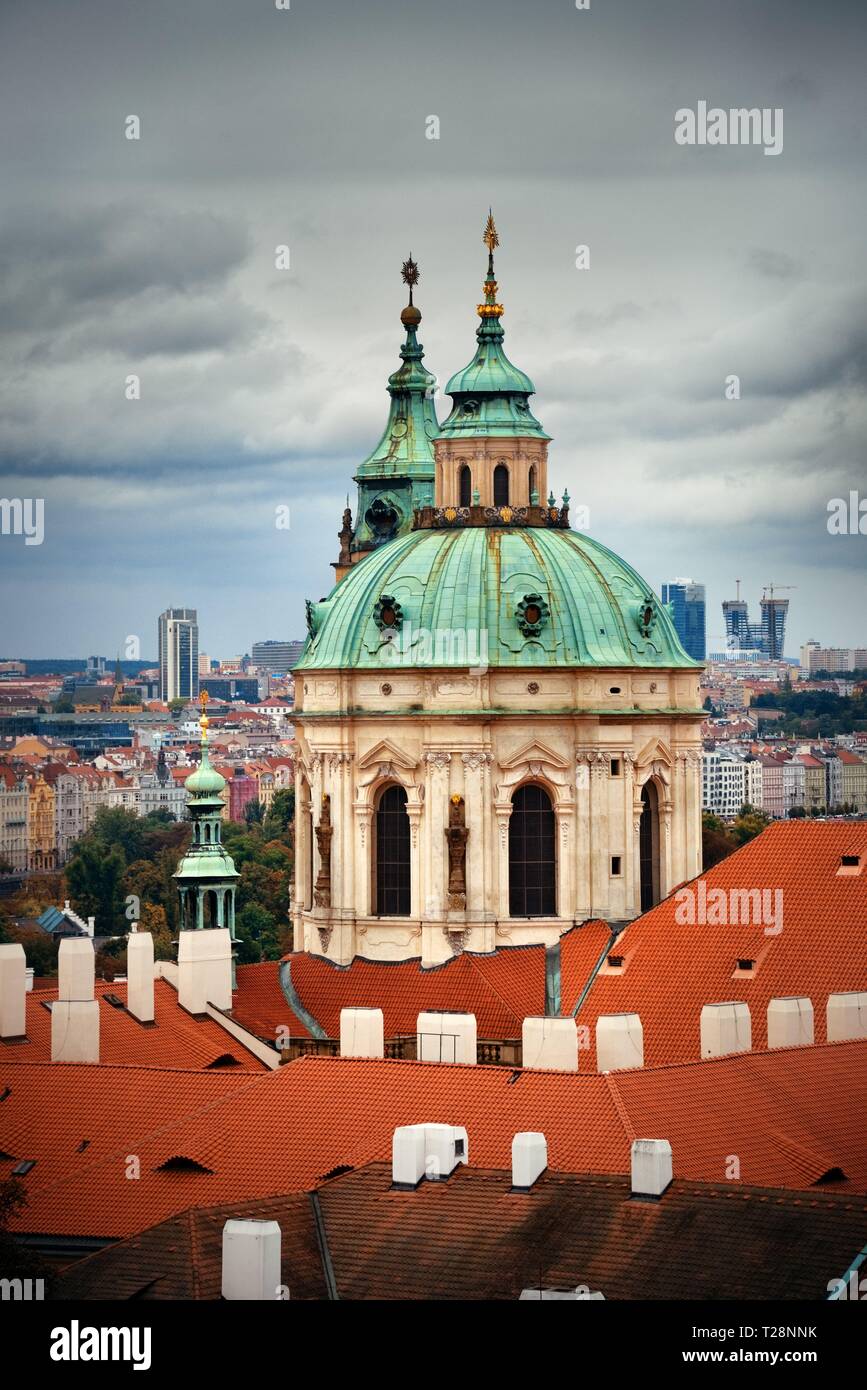 Prague skyline rooftop view with church and dome in Czech Republic ...