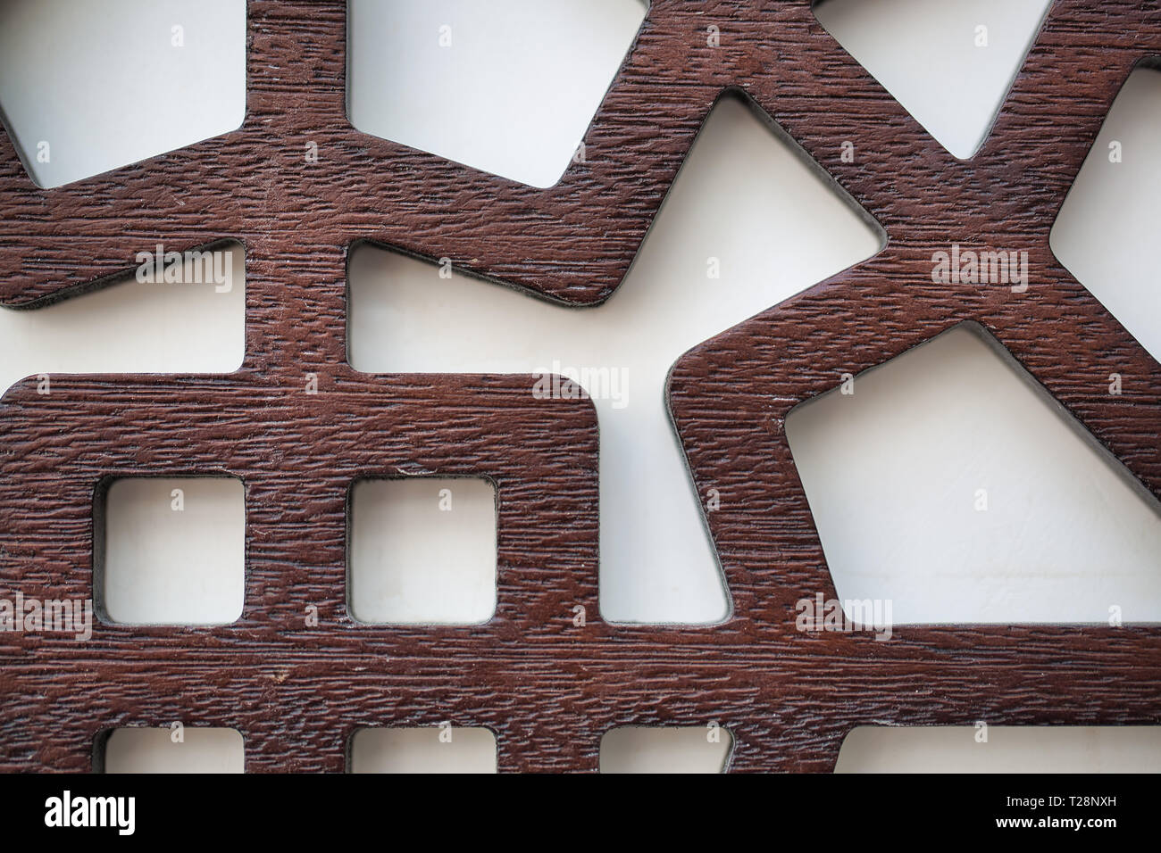 DOHA, QATAR - SEPTEMBER 22, 2014: Brown wooden design lines and shapes ...