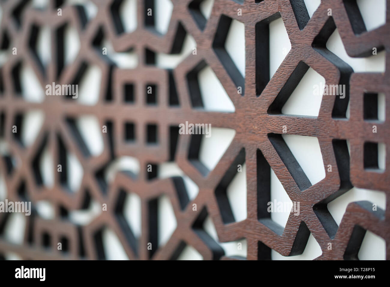 DOHA, QATAR - SEPTEMBER 22, 2014: Wooden design in the wall with ...