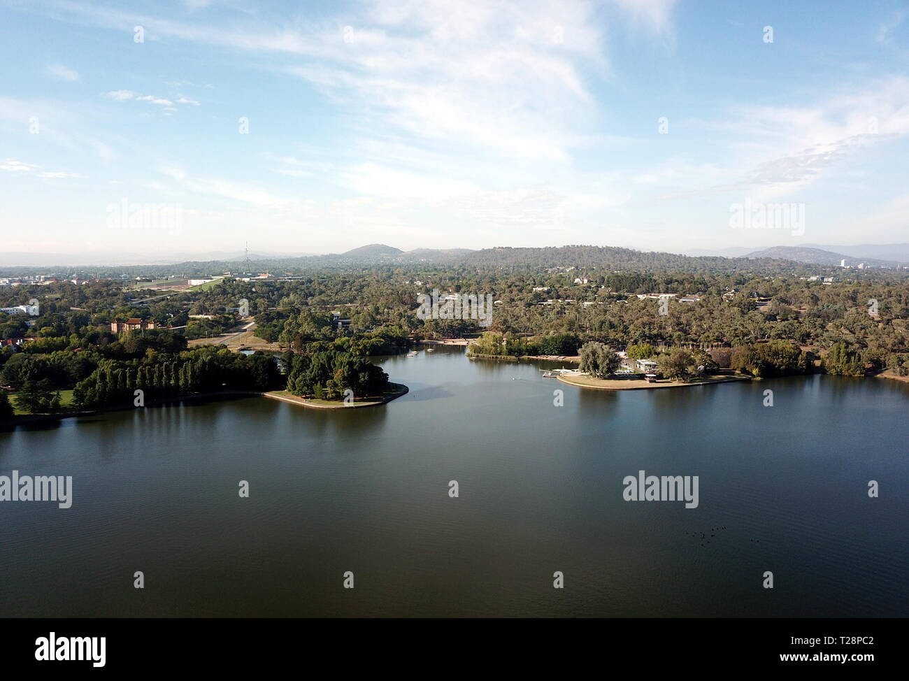 Panoramic view of Canberra (Australia) in daytime, featuring Lake Burley Griffin and Parliament ...
