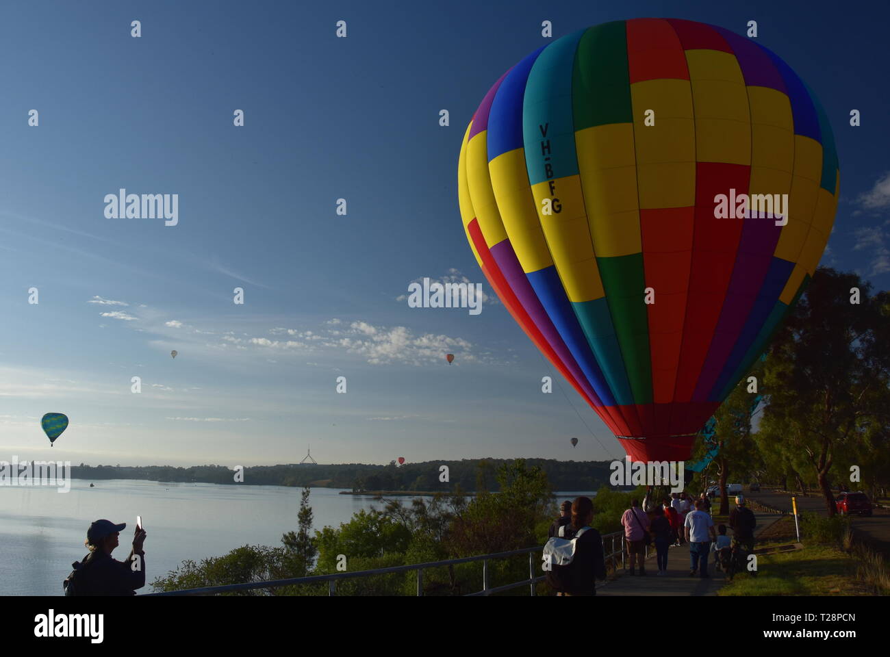 Canberra, Australia - March 10, 2019. Hot air balloons landing at Lake ...