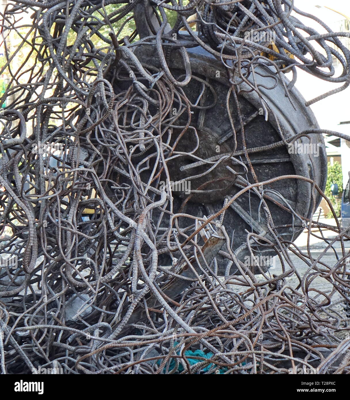 A powerful industrial magnet picks up scrap metal from a demolition ...