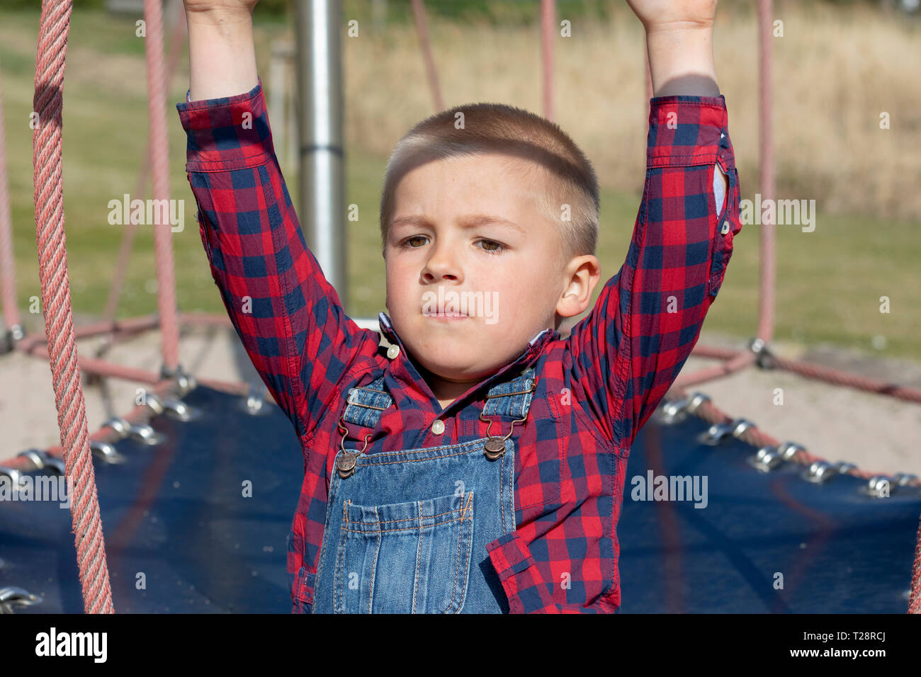 Person wearing clothes too small hi-res stock photography and images ...