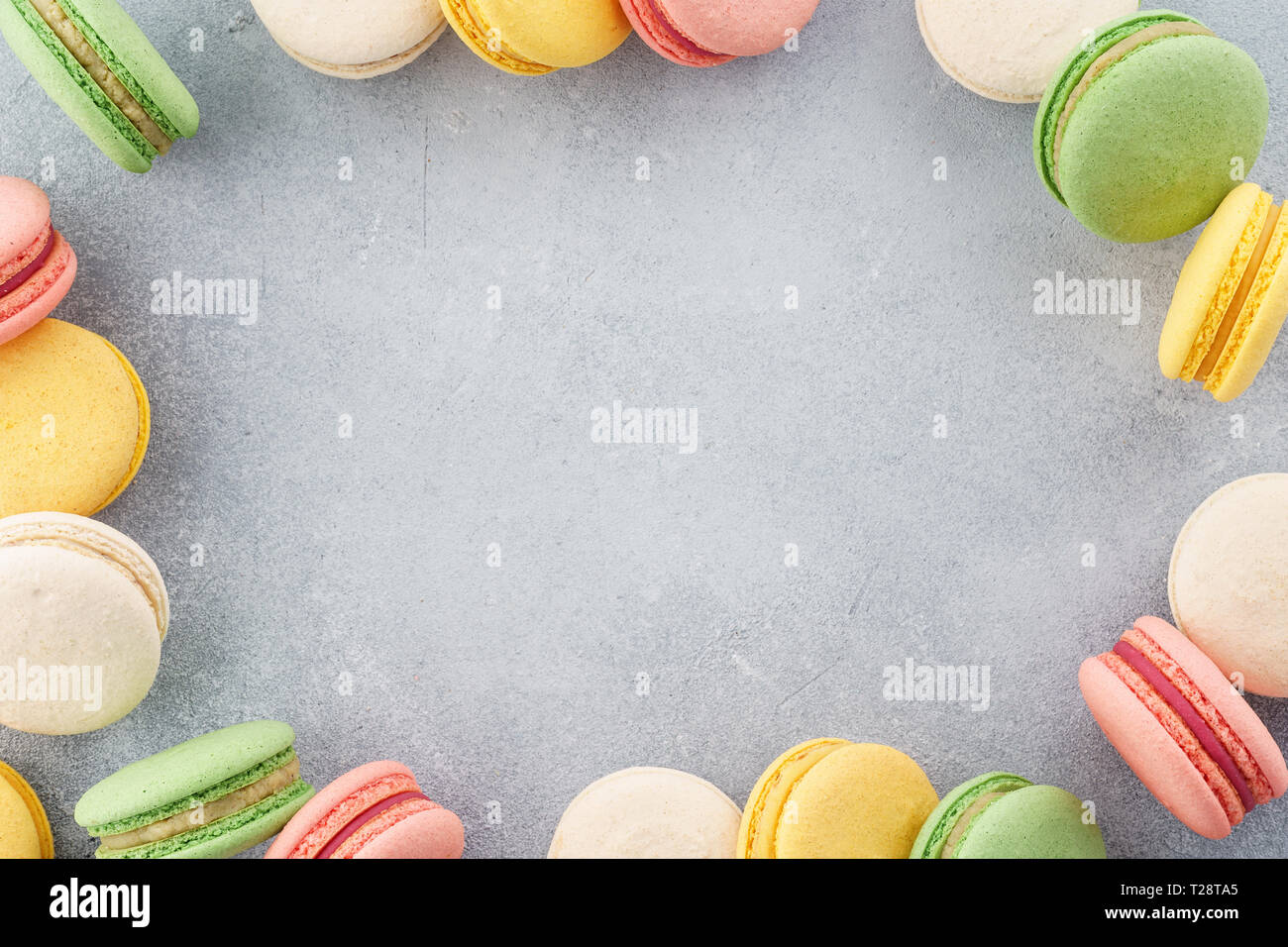 Frame made of colorful french macarons. Creative background with space ...