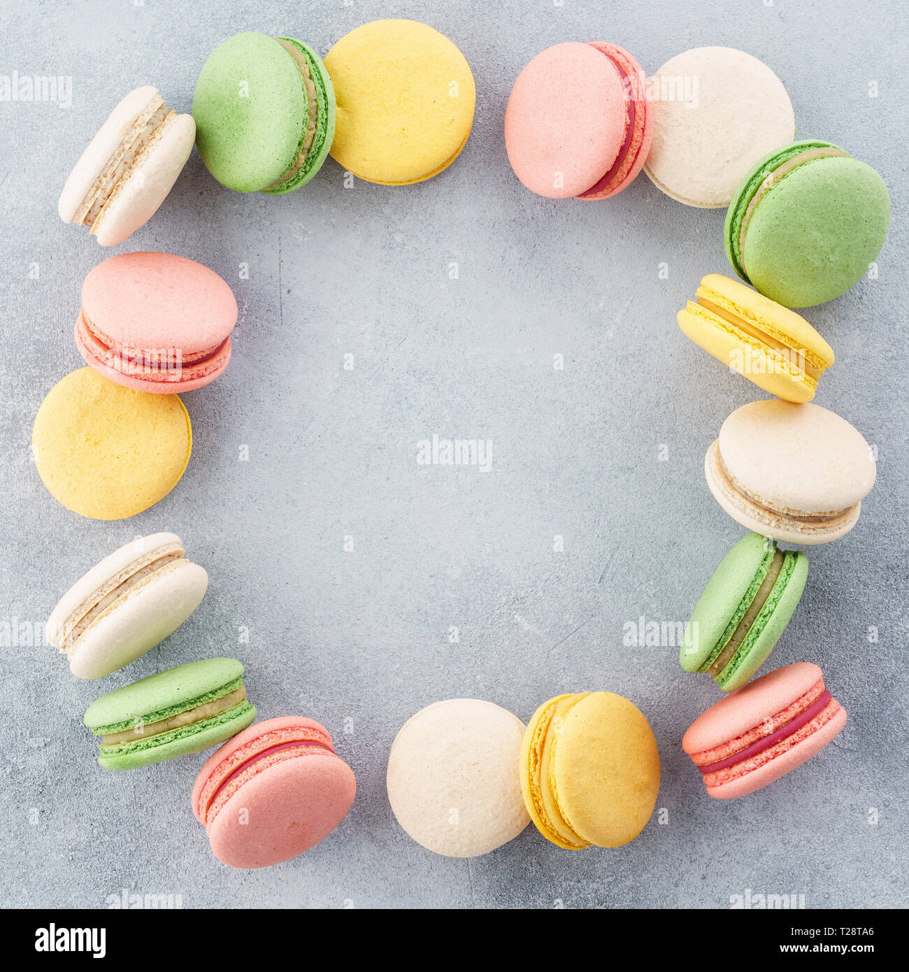 Frame made of colorful french macarons. Creative background with space ...