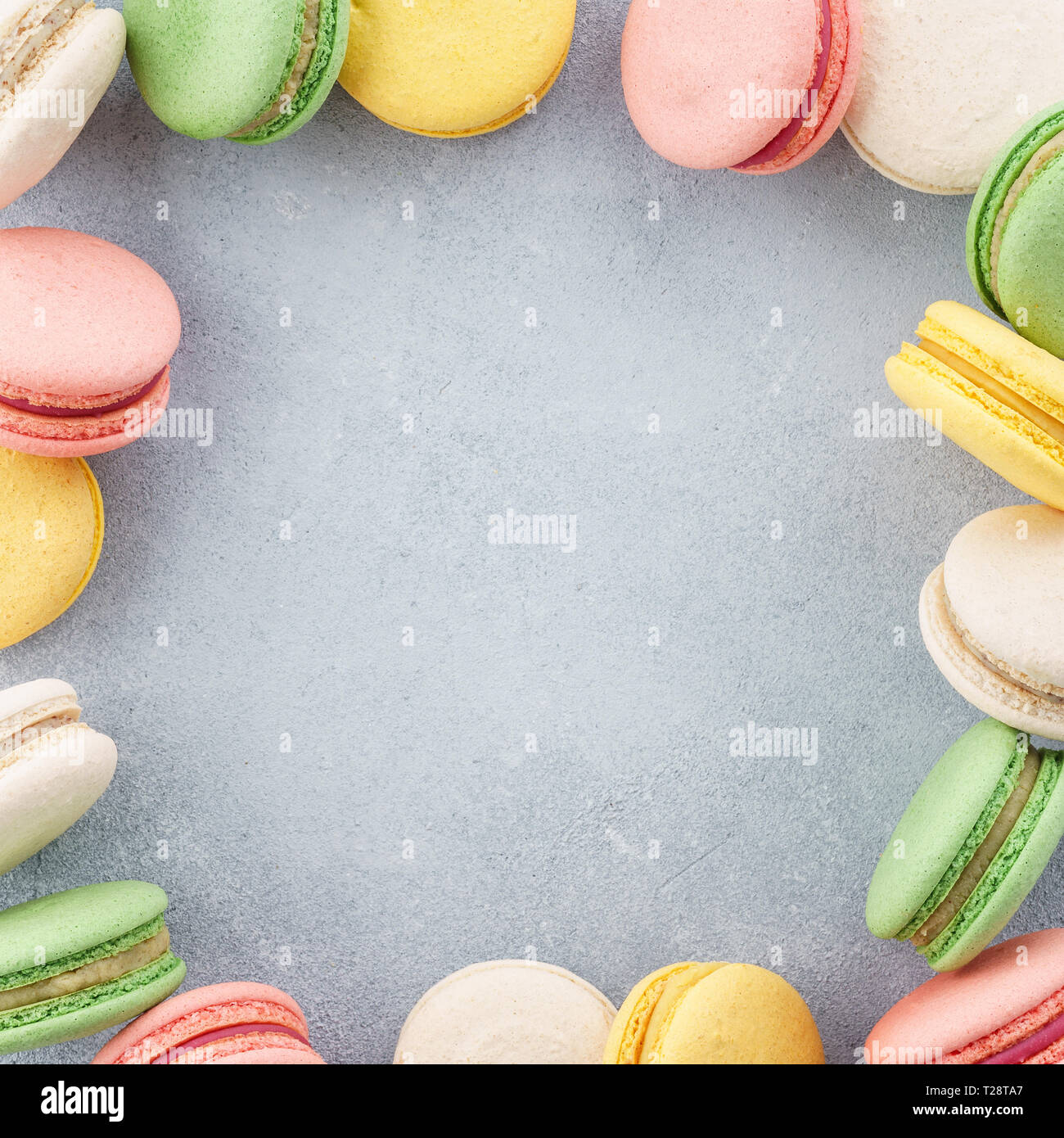 Frame made of colorful french macarons. Creative background with space ...