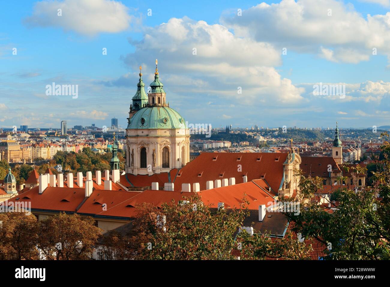Prague skyline rooftop view with church and dome in Czech Republic ...