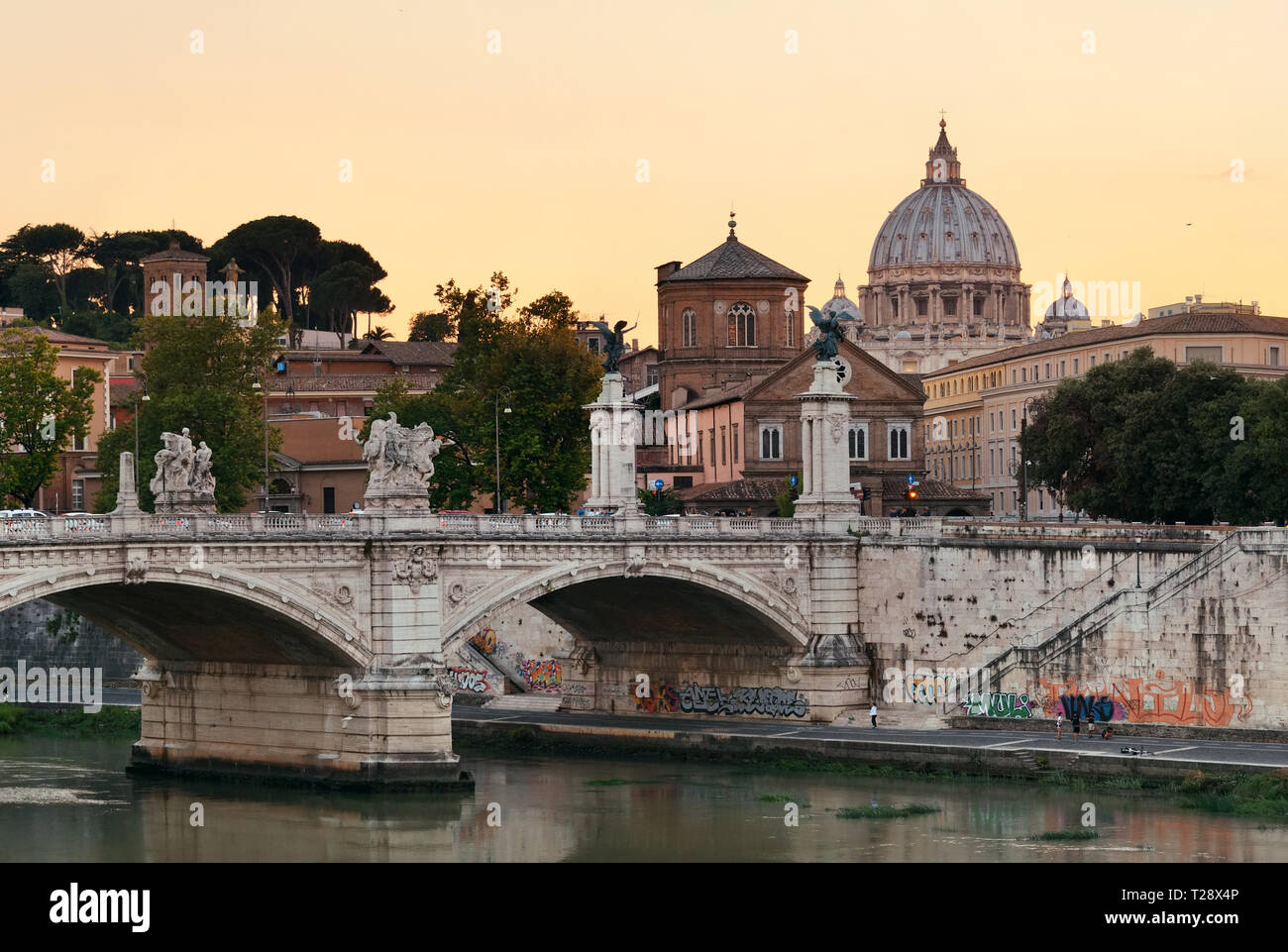 River Tiber and St Peters Basilica in Vatican City at sunset Stock ...