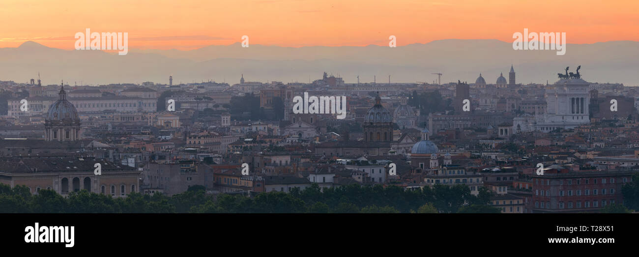 Rome rooftop view with ancient architecture in Italy before sunrise ...