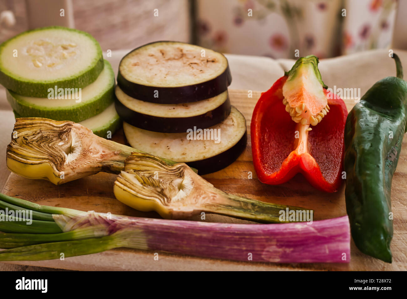 Mix of raw vegetables ready to be roasted Stock Photo - Alamy