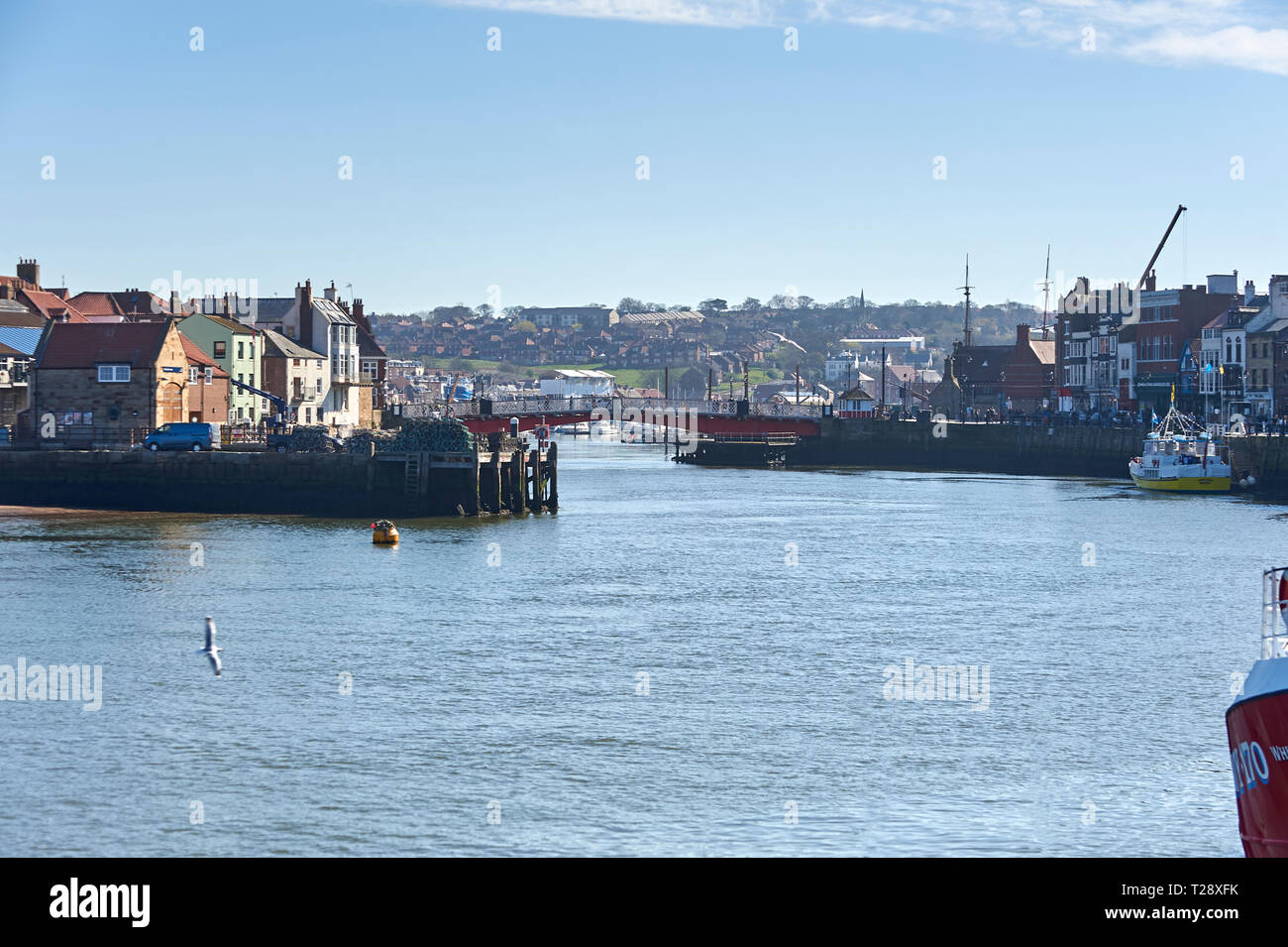 Beautiful spring day at the harbour in Whitby , North Yorkshire Coast ...
