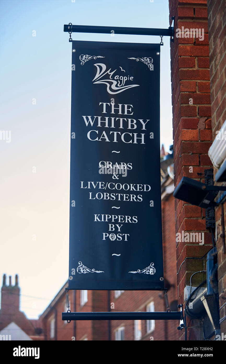 Kippers by post on an overhead hoarding overlooking the harbour at ...