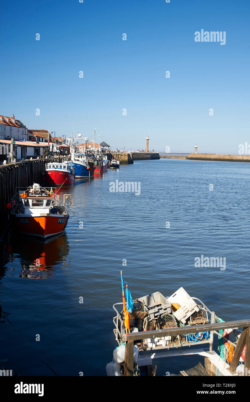 Beautiful spring day at the harbour in Whitby , North Yorkshire Coast ...