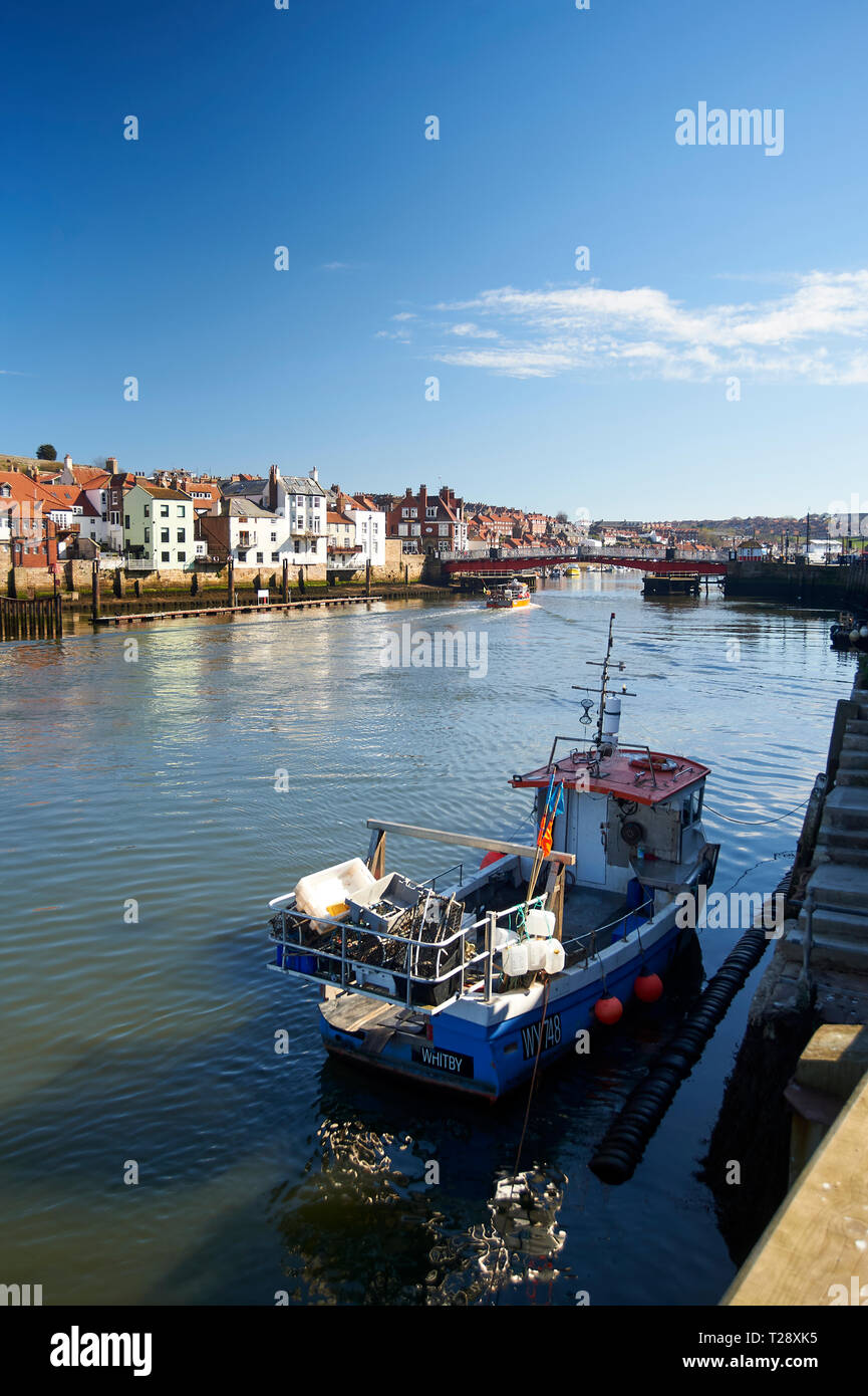 Beautiful spring day at the harbour in Whitby , North Yorkshire Coast ...