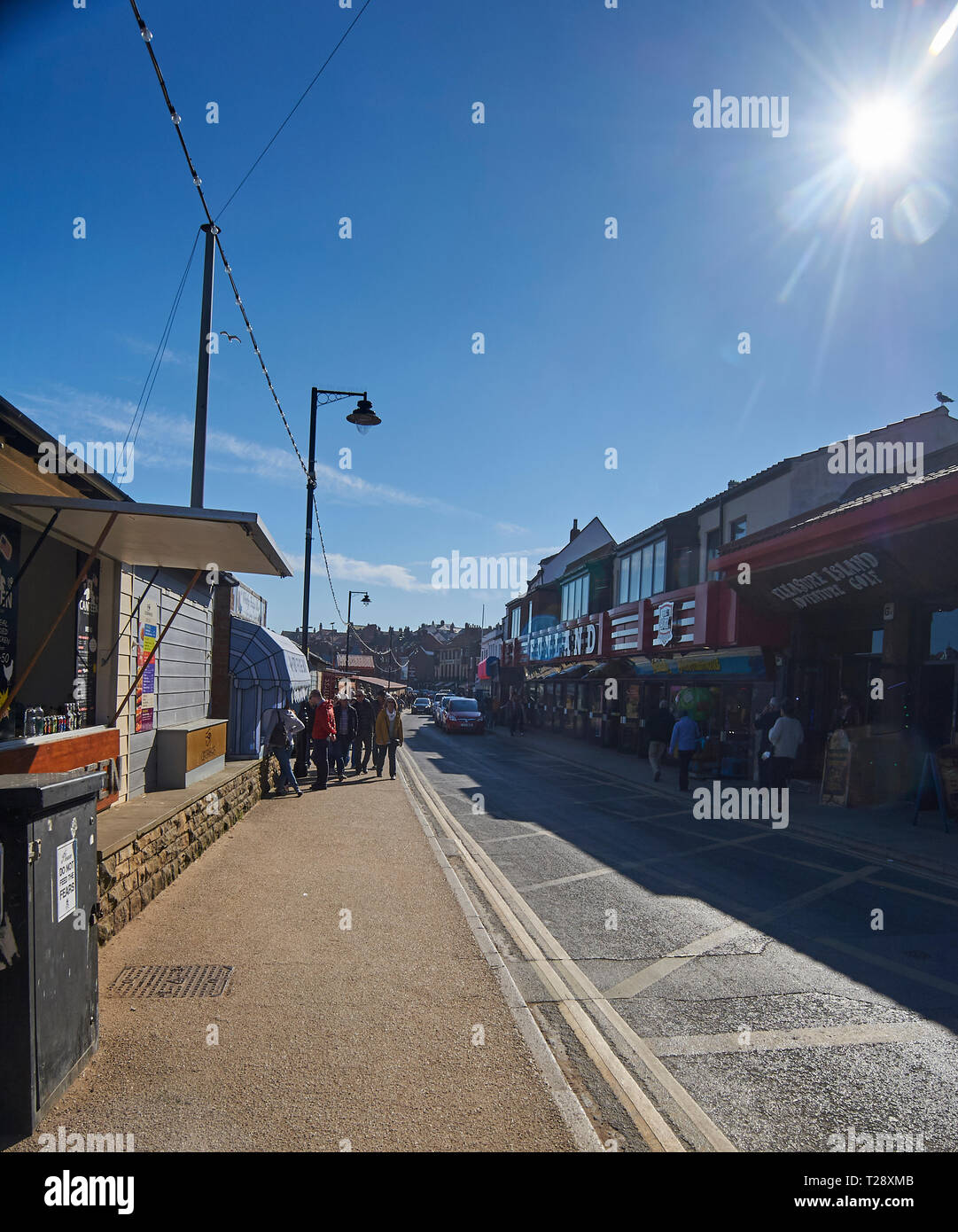 Crowds of people enjoying the fine spring weather at Whitby , North ...