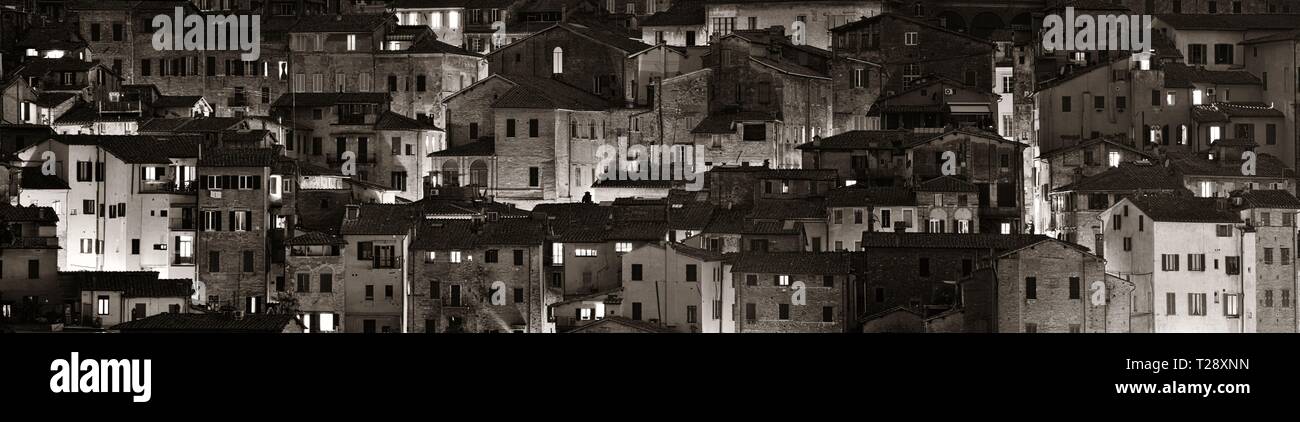 Old building background at night from Siena, Italy Stock Photo - Alamy