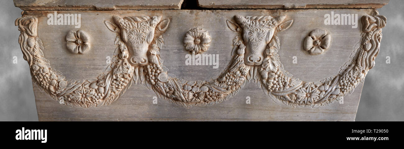 Roman relief sculpted garland sarcophagus with reliefs of bulls heads ...