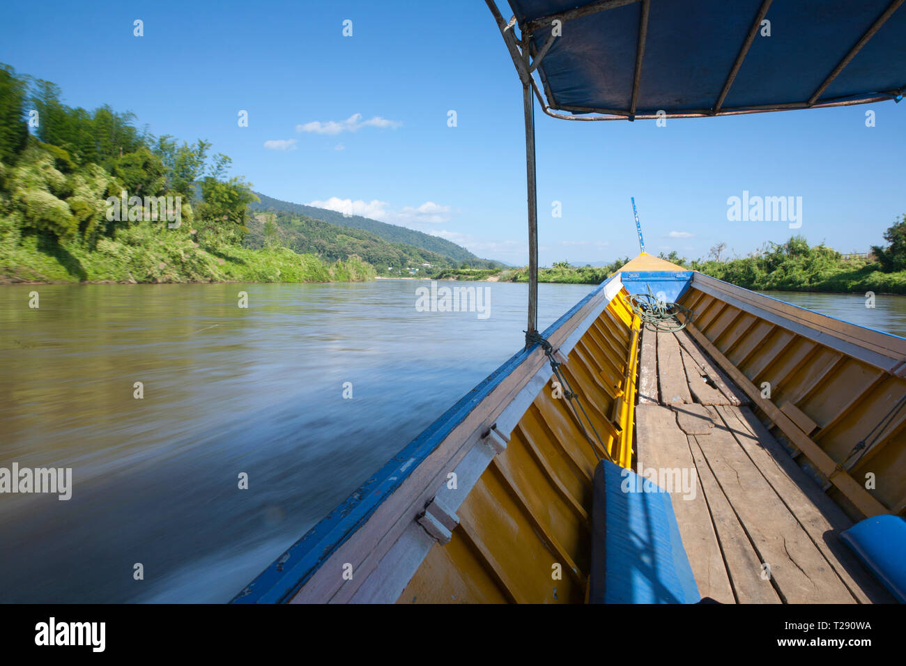A Thai river longboat on the Kok River, Thailand Stock Photo - Alamy