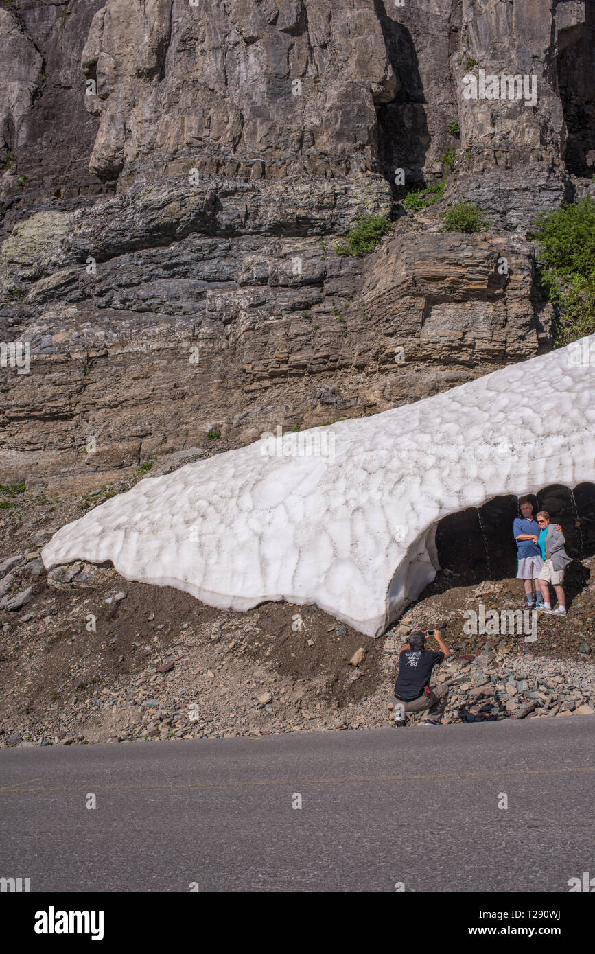 A snow bridge is a surprising find in the hot summer in Glacier ...