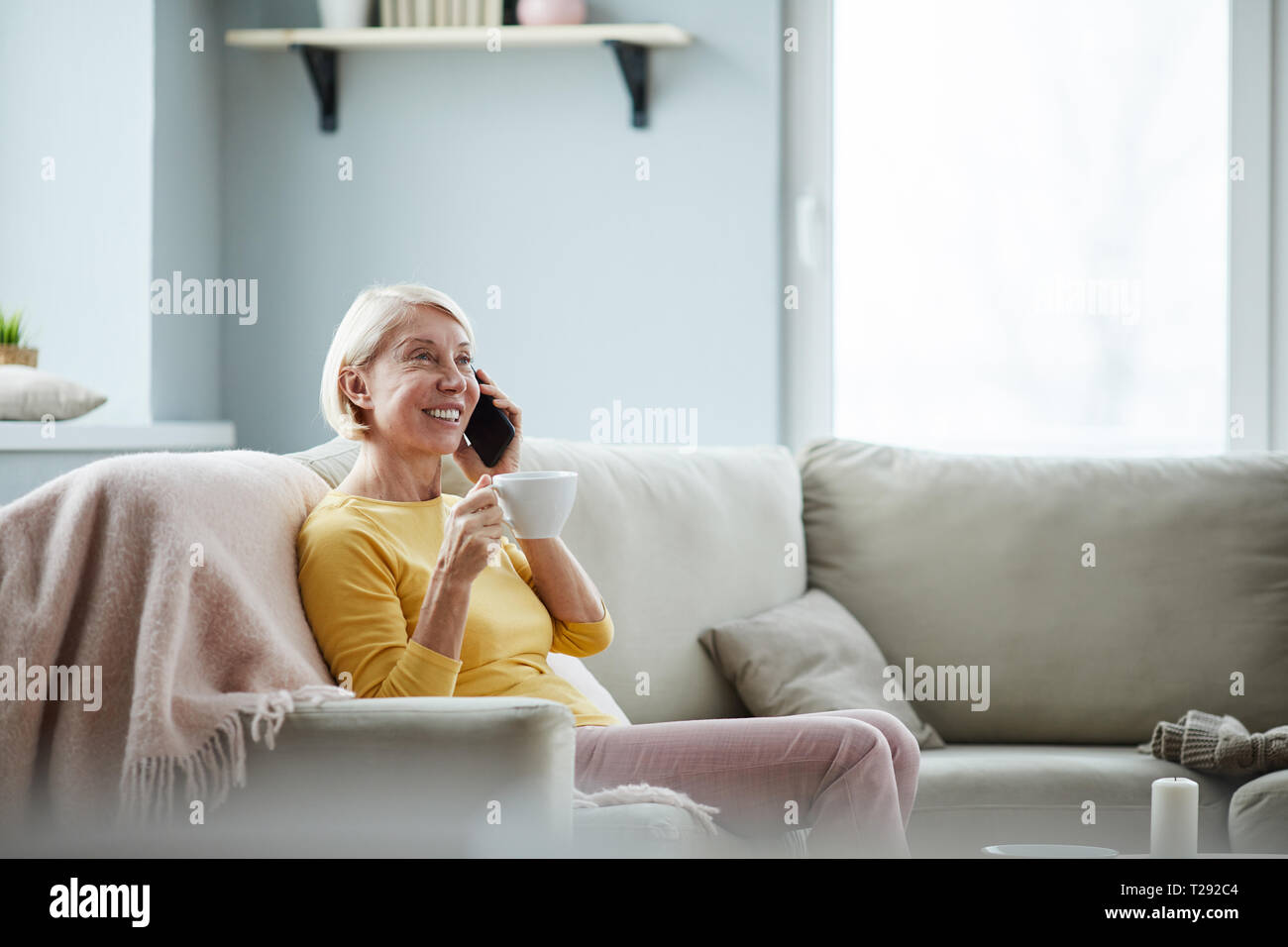 Lady drinking coffee hi-res stock photography and images - Alamy